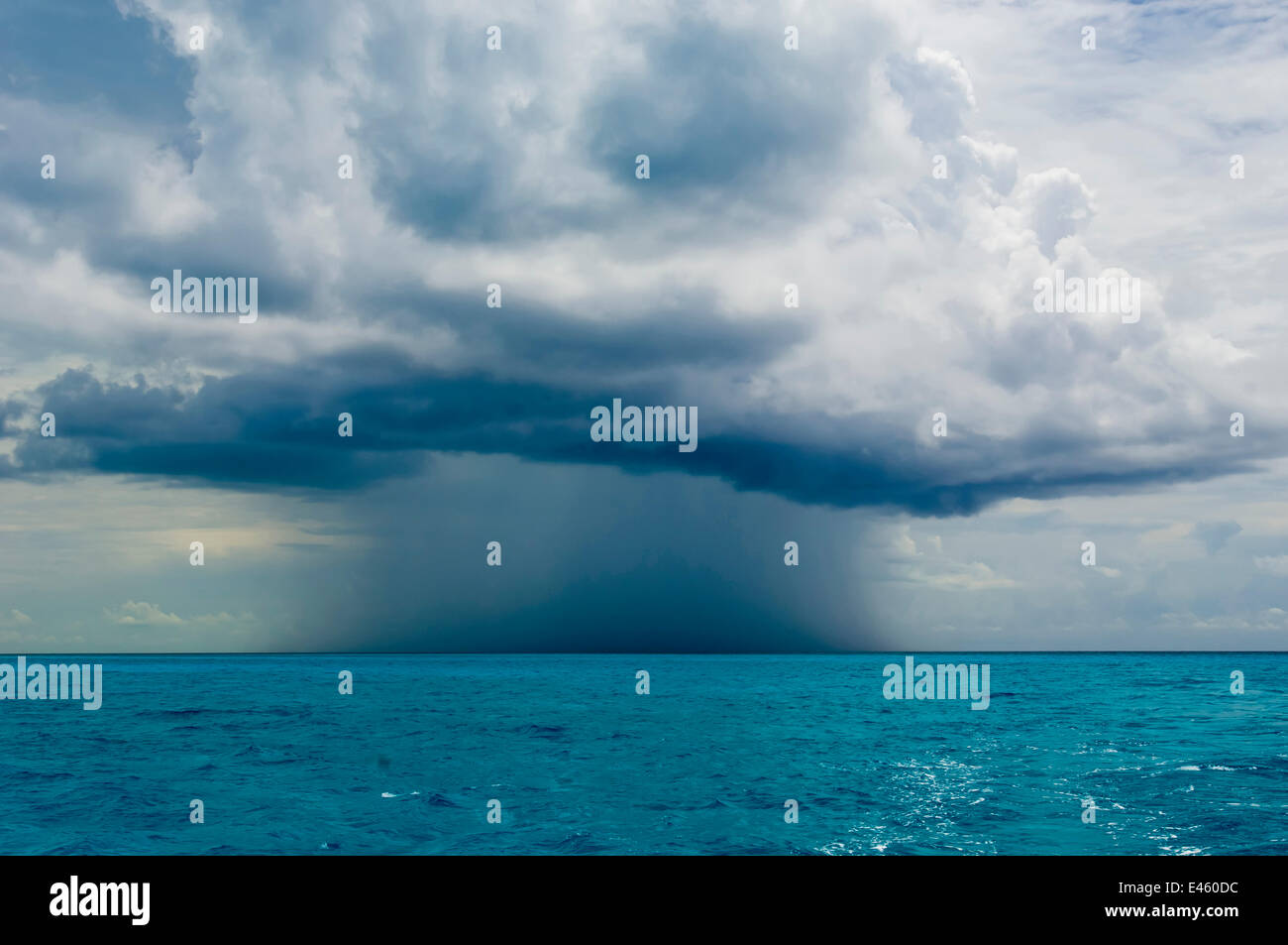 Isolated rain storm above the sea. Bahamas Sea, Bahamas, North America ...
