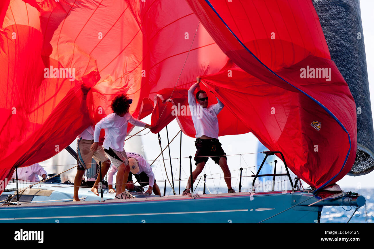 Crew salvaging spinnaker as it drops during the Heineken Regatta, St ...
