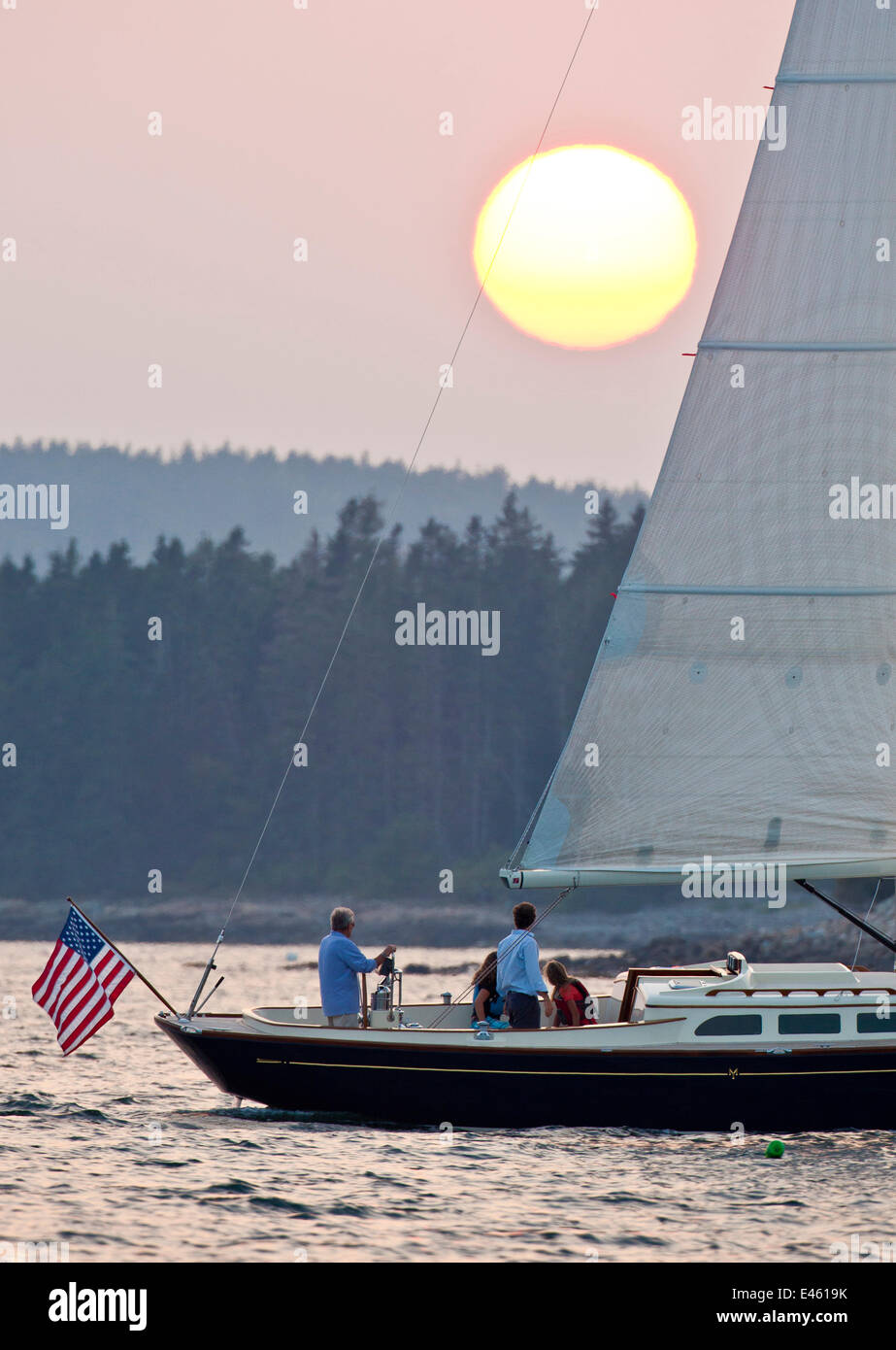 Family watching sunset on board Morris 42 extend coach house yacht ...