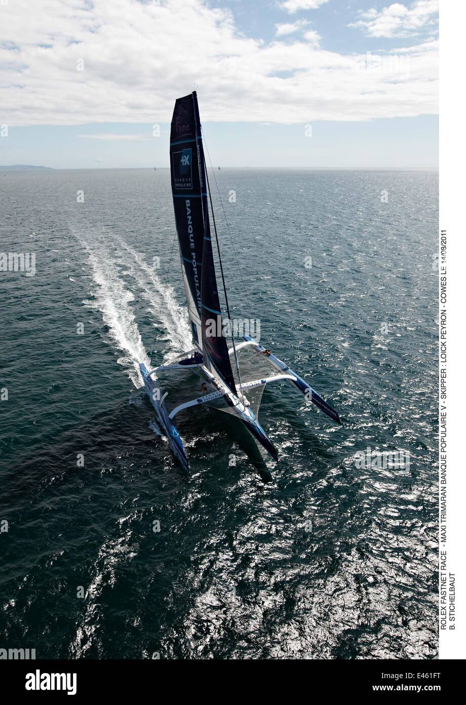 Maxi-trimaran 'Banque Populaire V' skippered by Loick Peyron during the ...
