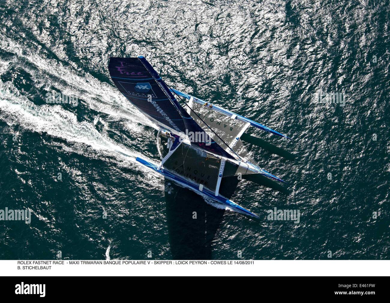 Maxi-trimaran 'Banque Populaire V' skippered by Loick Peyron during the ...