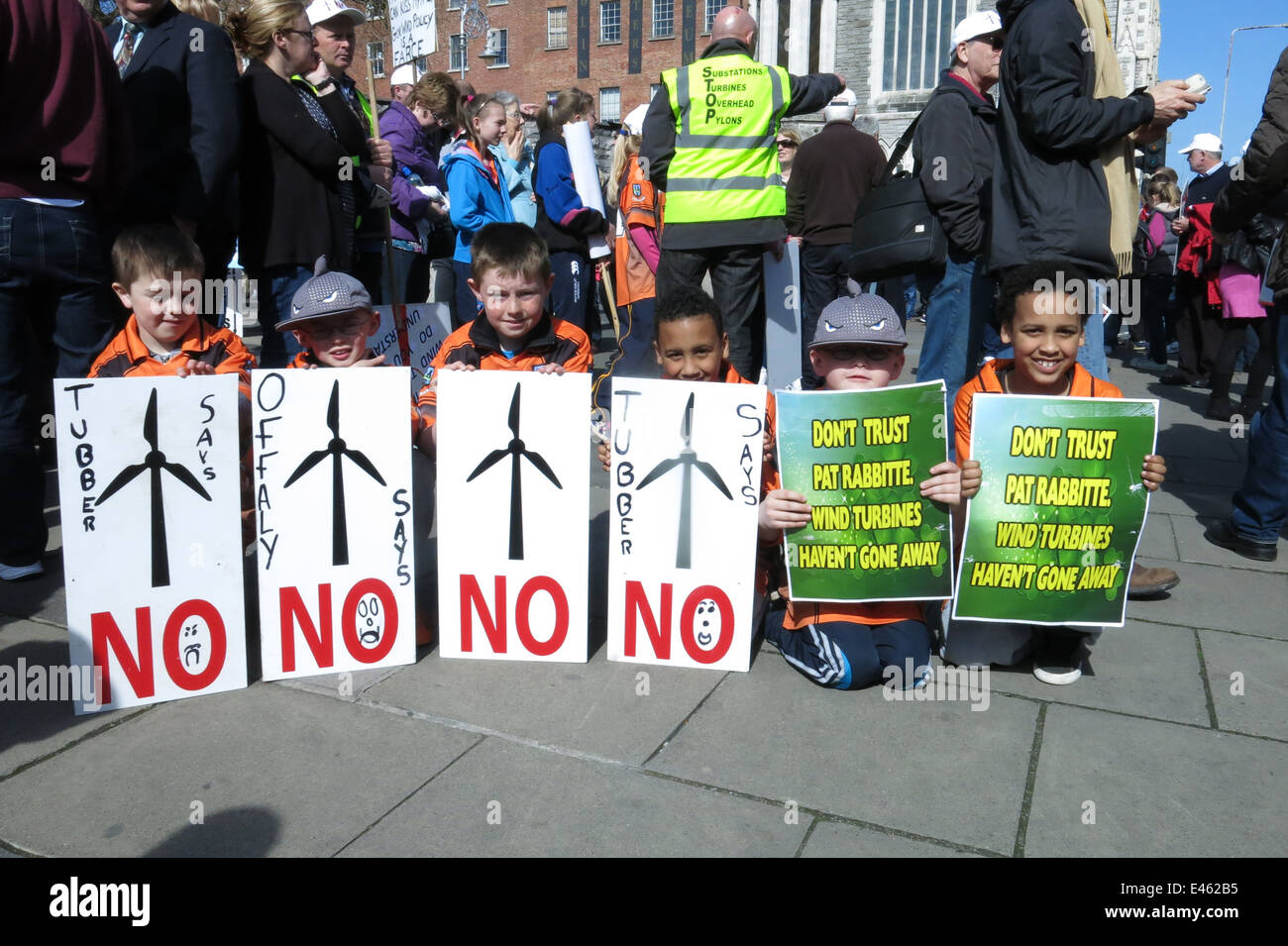 A group of boys hold signs during a protest in Dublin city centre by ...