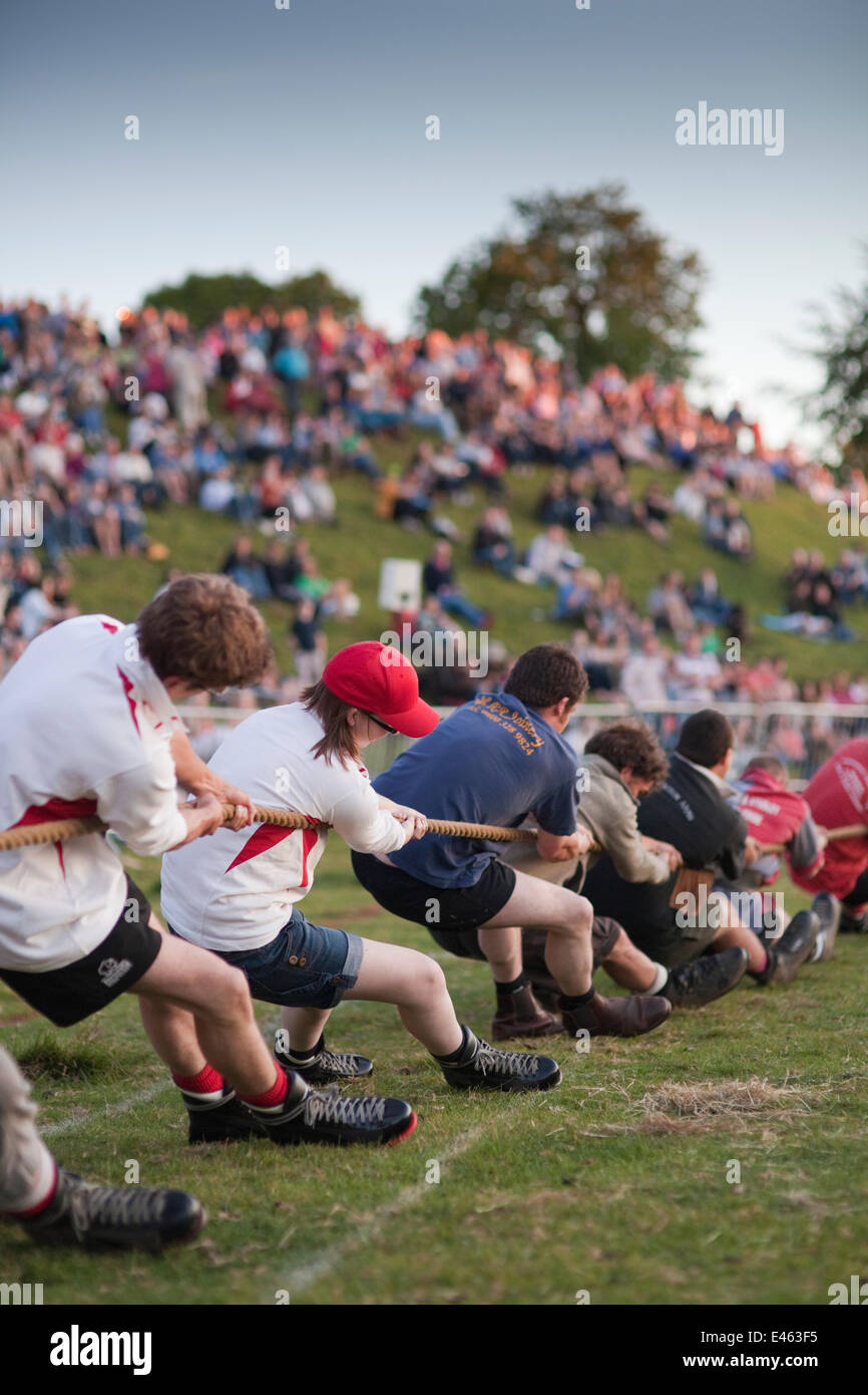 Men pulling on a rope in a tug of war competition, Cotswold Olimpicks ...