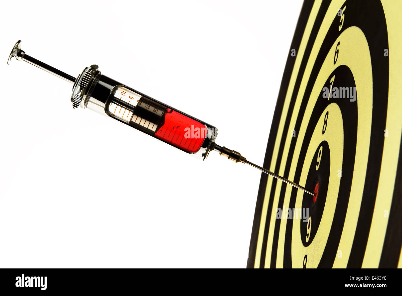 The syringe of a doctor in the middle of a target. Injection with blood ...