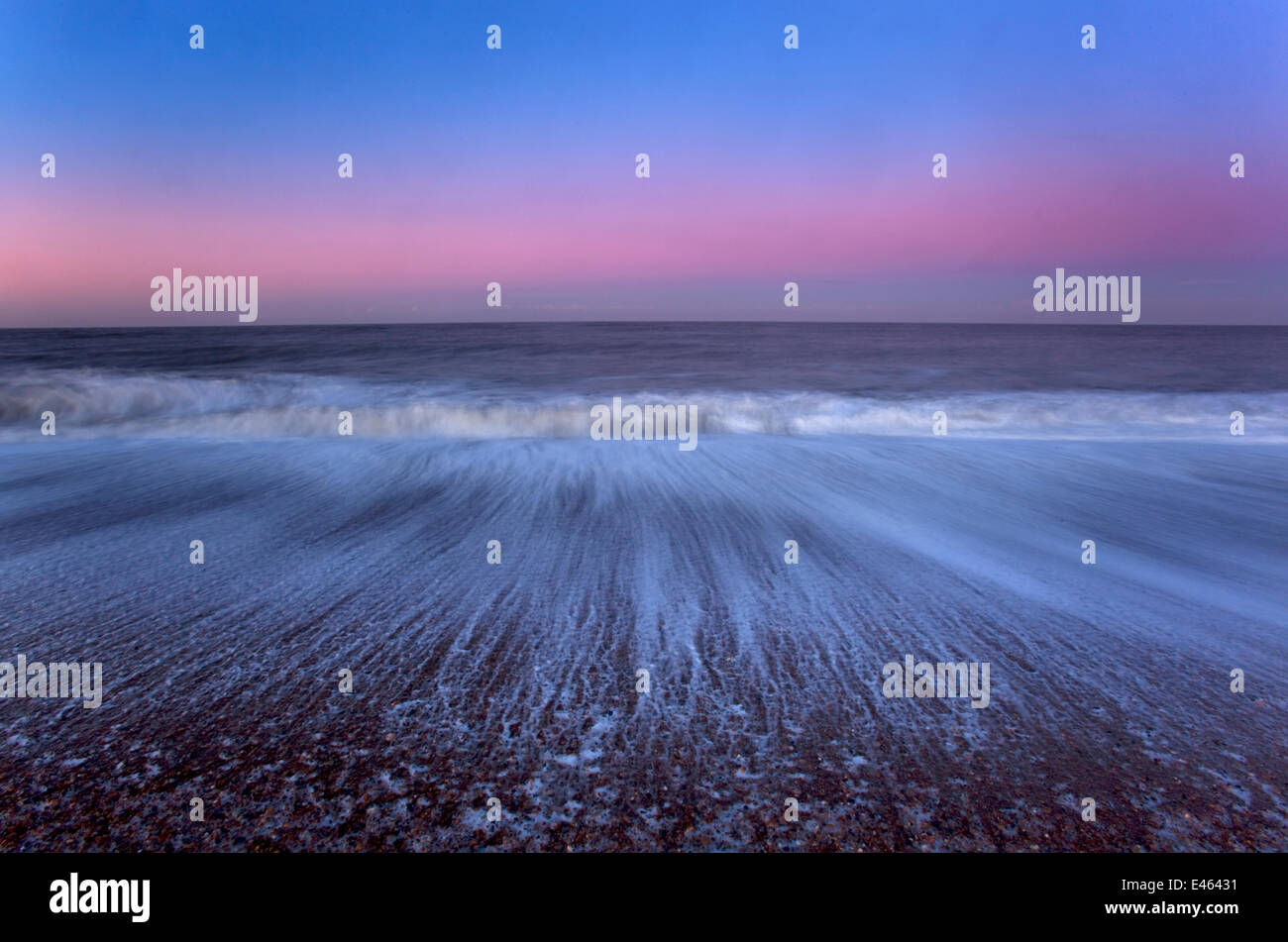 Cley Beach with retreating wave patterns, after sunset, Norfolk, UK ...