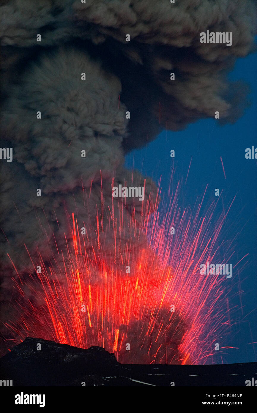Ash plume and lava erupting from the Eyjafjallajökull volcano, Iceland ...