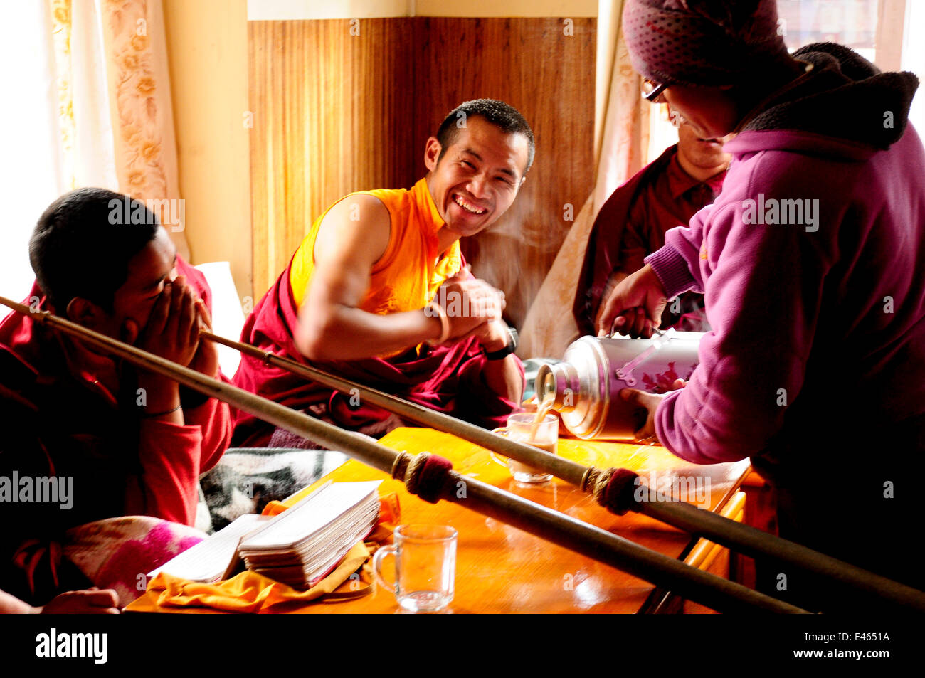 Buddhist monks drinking tea during ceremony in Namche Bazar, Sagarmatha ...