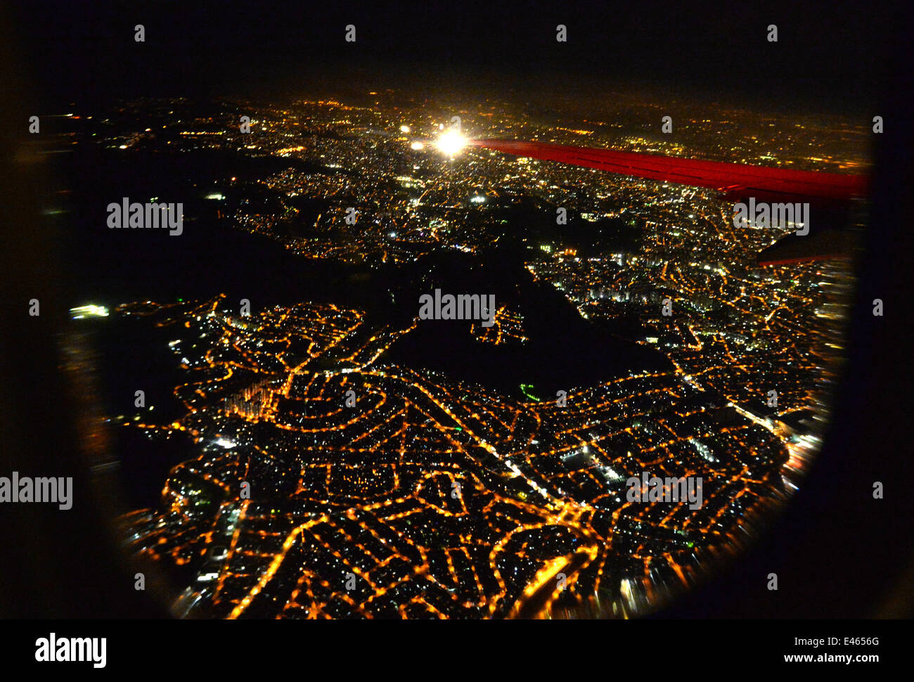 A general view through a window in a plane during landing in Sao Paulo ...