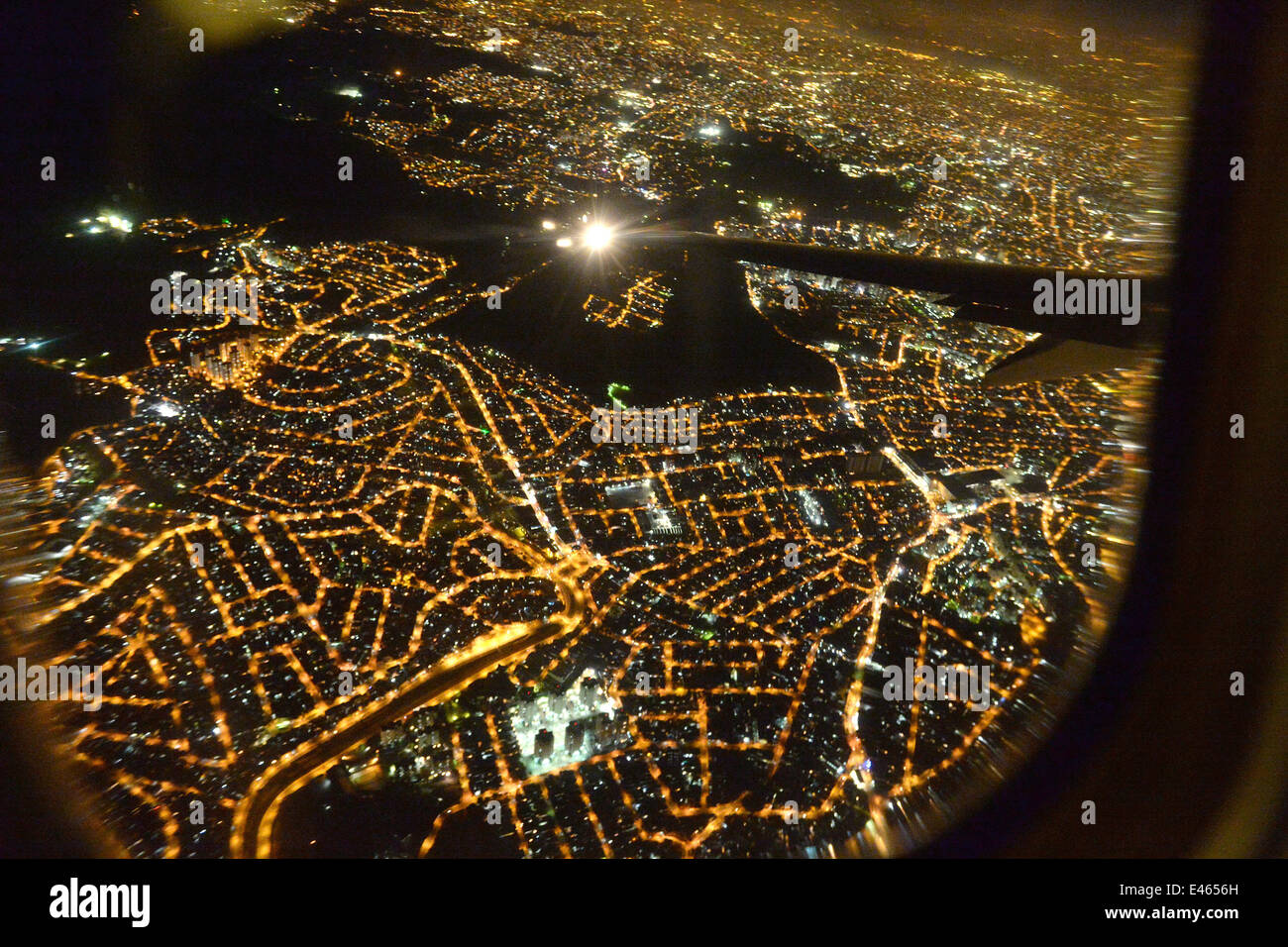 A general view through a window in a plane during landing in Sao Paulo ...