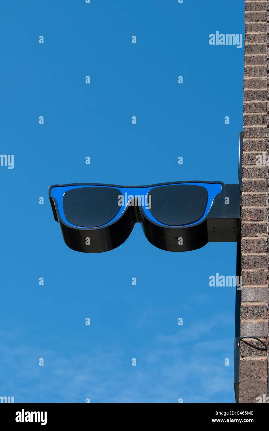 oversized spectacles forming a hanging sign for an optician in hounslow ...
