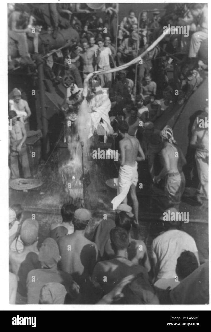 This photograph depicts the traditional crossing-the-equator ceremony ...