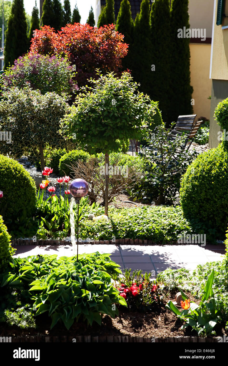 A beautiful front yard in a residential house in spring Stock Photo - Alamy