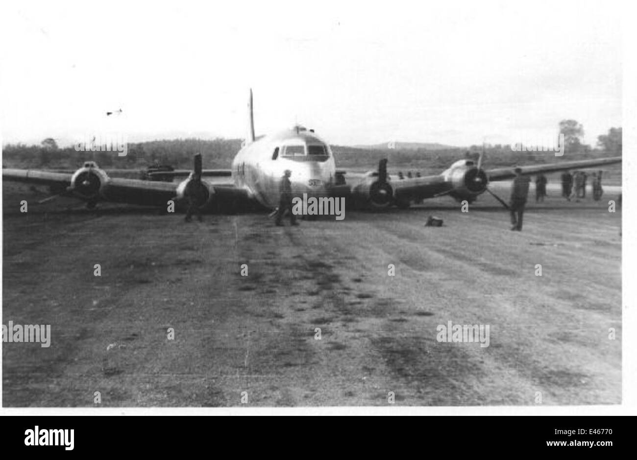 The C-54 aircraft, shown with its wheels up, was an essential transport ...