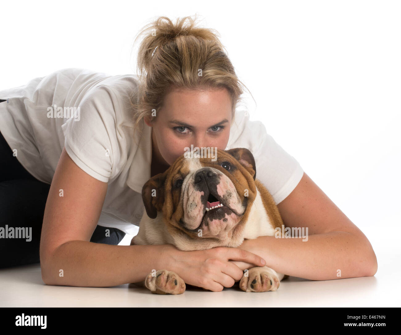woman hugging english bulldog puppy Stock Photo - Alamy