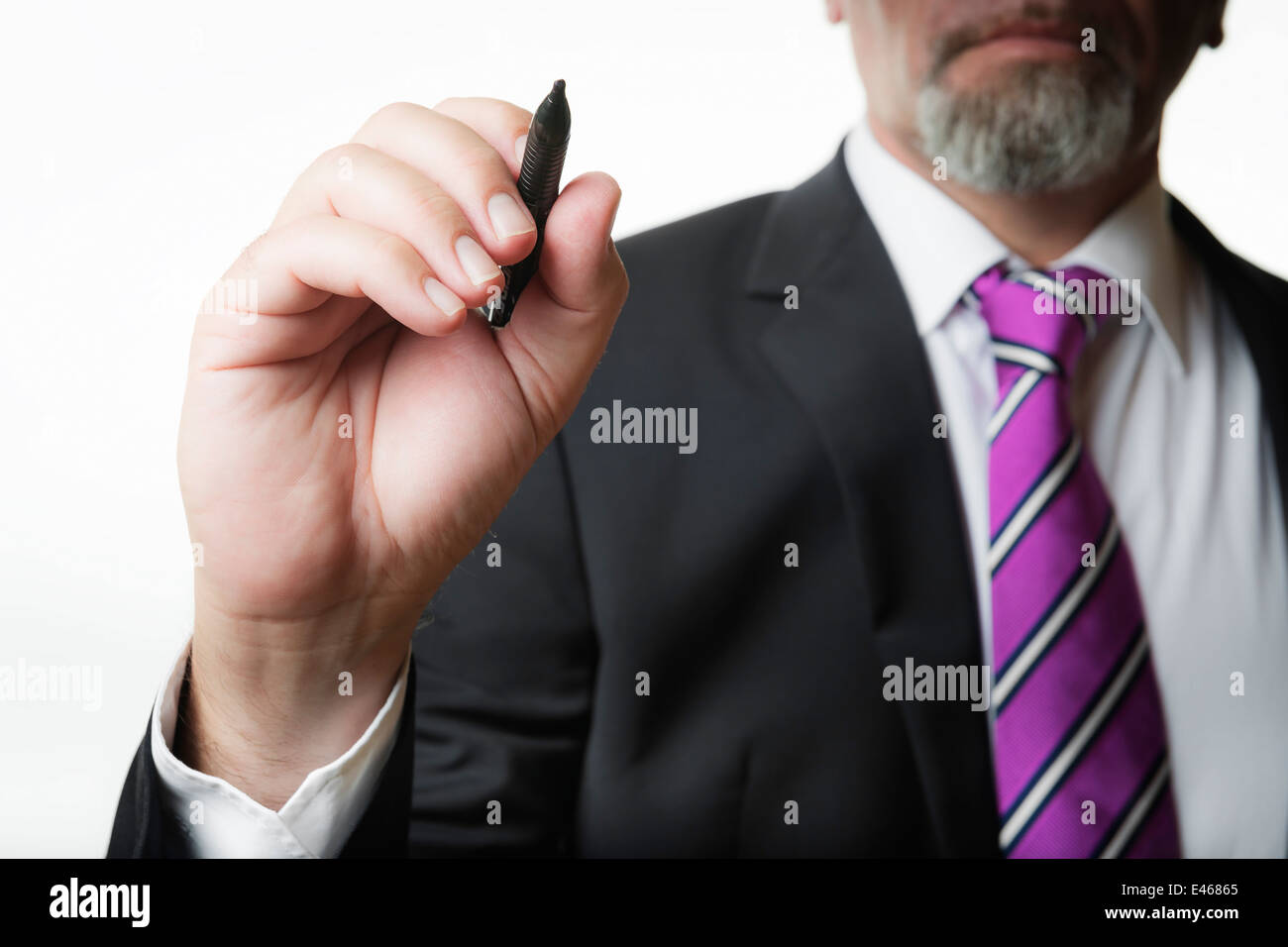 Business man with marker isolated on white background Stock Photo - Alamy