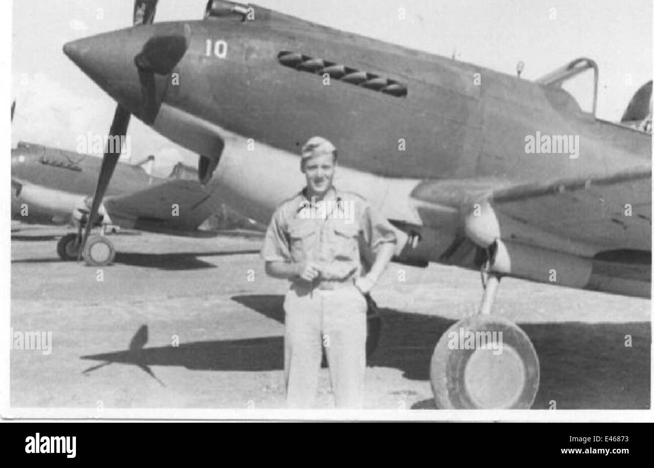 This image features Johnny Farrell, a pilot of the Flying Tigers ...