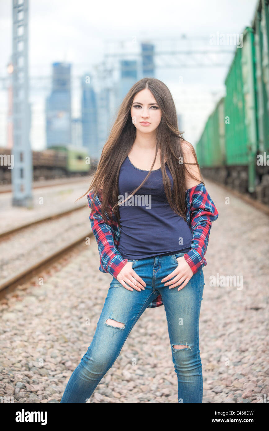 Girl at railroad Stock Photo - Alamy