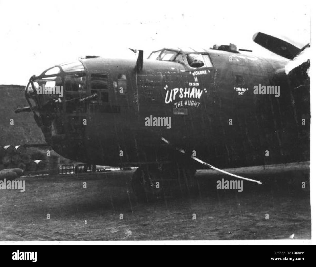 The photograph depicts a B-24 aircraft of the 14th Air Force ...