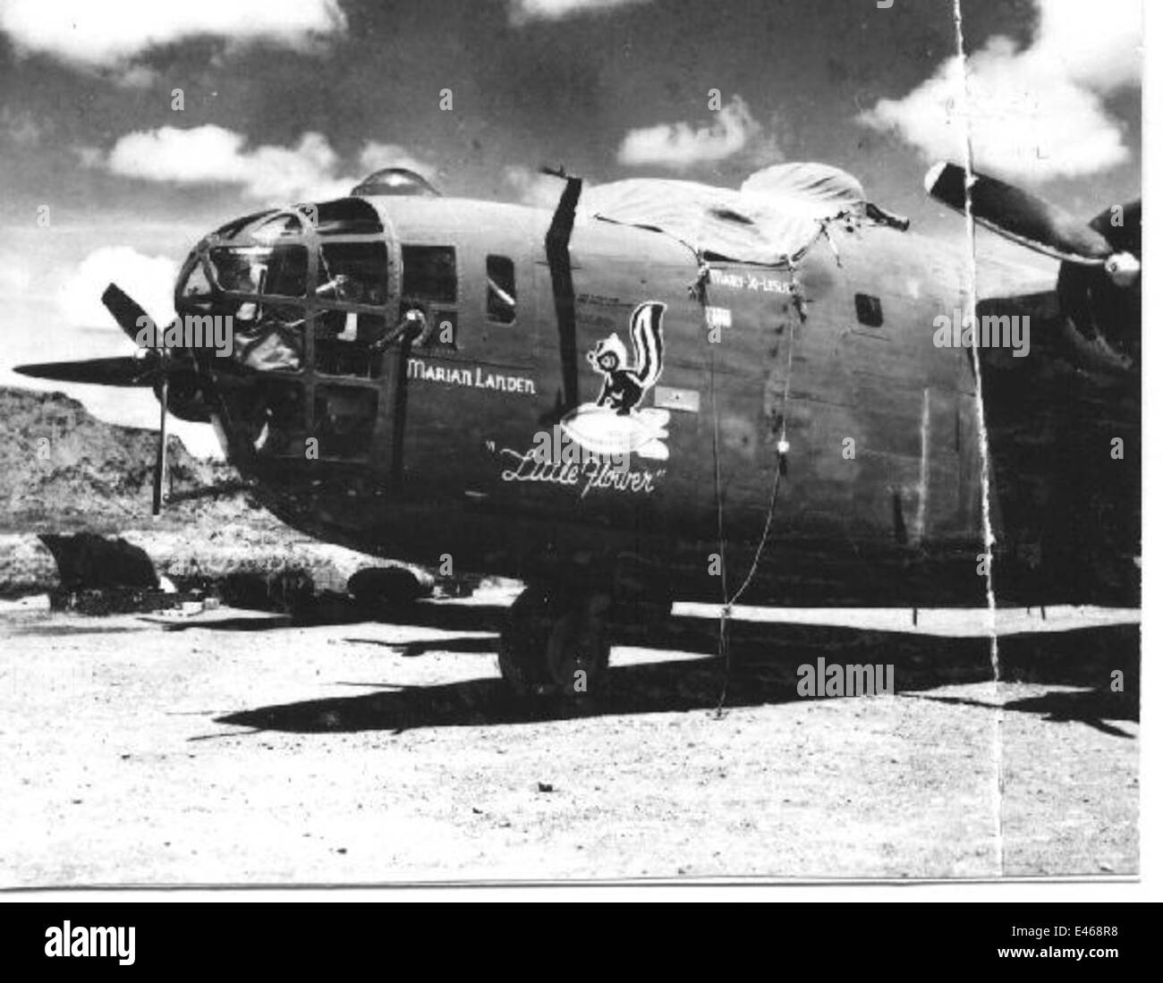This photograph shows a B-24 bomber, part of the 14th Air Force, also ...