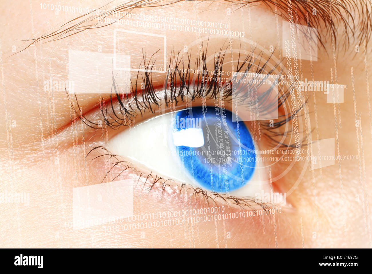 Woman blue eye looking on digital virtual screen close-up Stock Photo ...