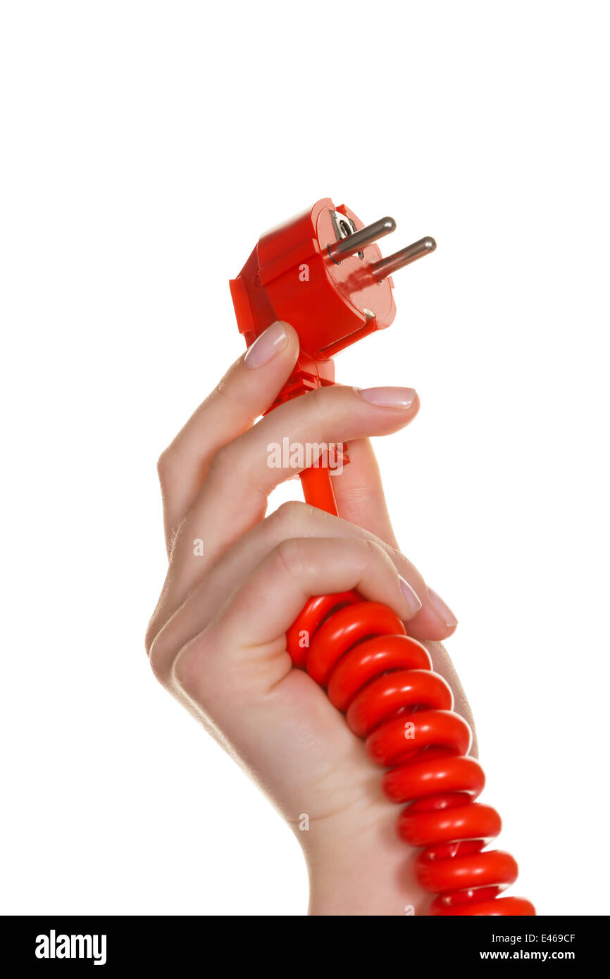 A woman's hand holding a red power connector Stock Photo - Alamy