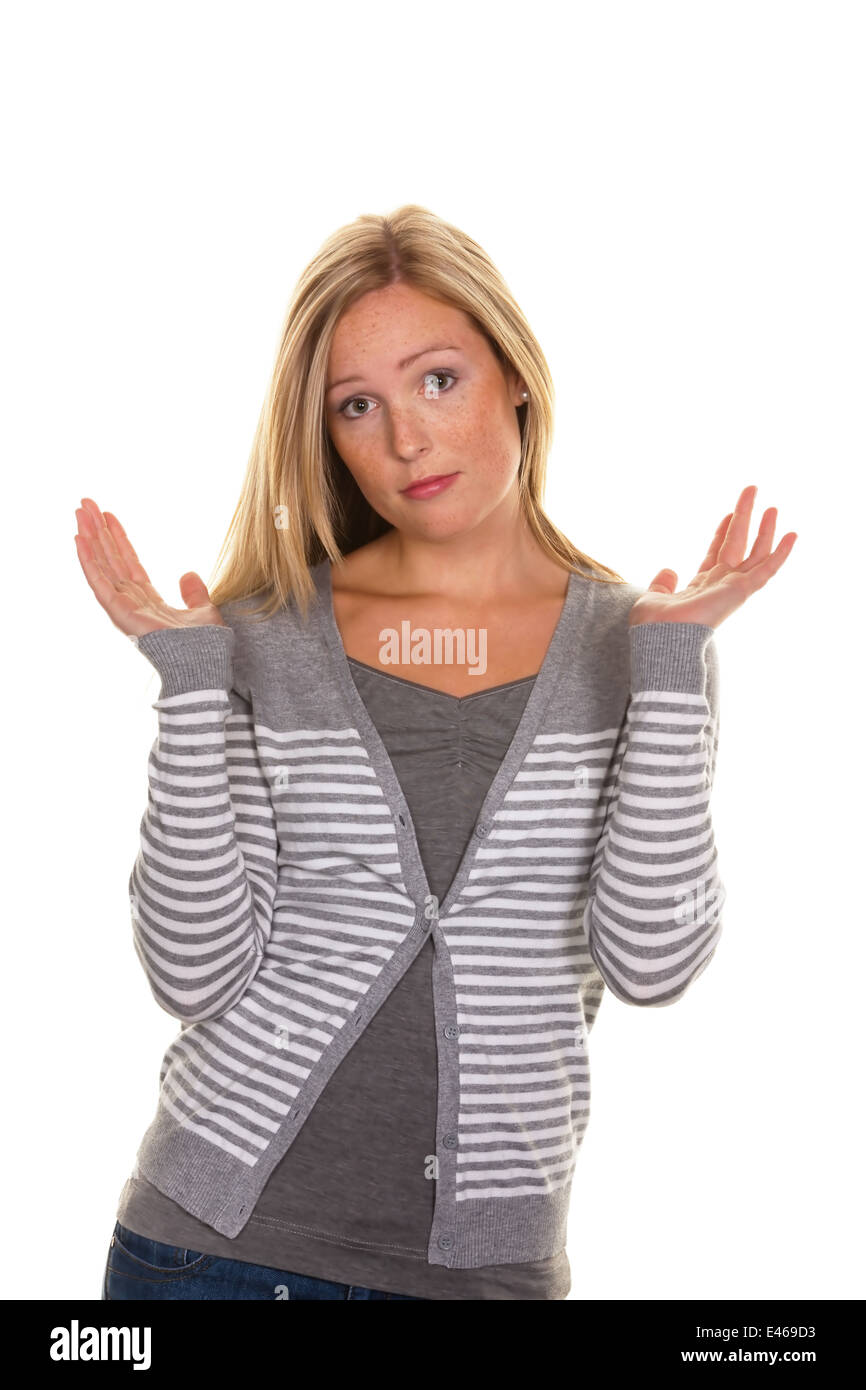 An unsuspecting woman shrugs. Shrug of helplessness Stock Photo - Alamy