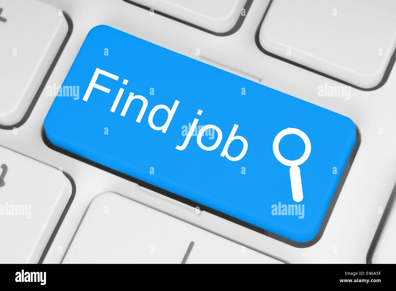 Blue find job button on white keyboard Stock Photo - Alamy