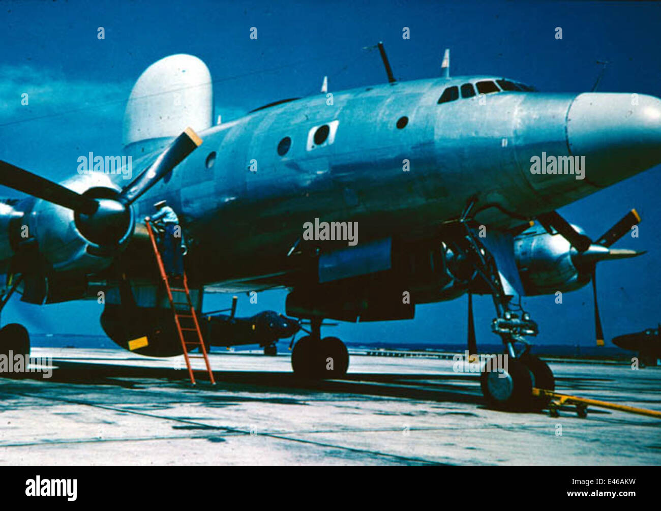 This image depicts a U.S. Navy aircraft, likely a variant of the VW-2 ...