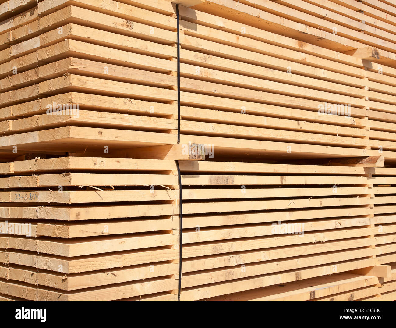 Stack of new wooden studs at the lumber yard Stock Photo - Alamy