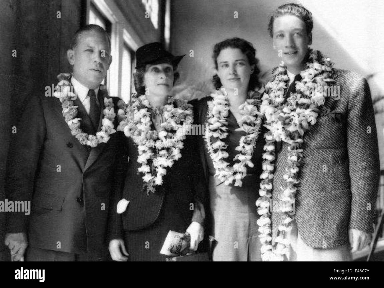 The image, with identification number 040, depicts four individuals ...