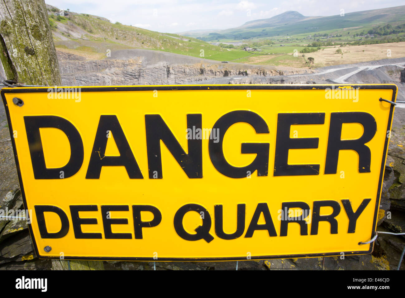 A danger sign on the edge of Dry Rigg quarry near Austwick in the ...