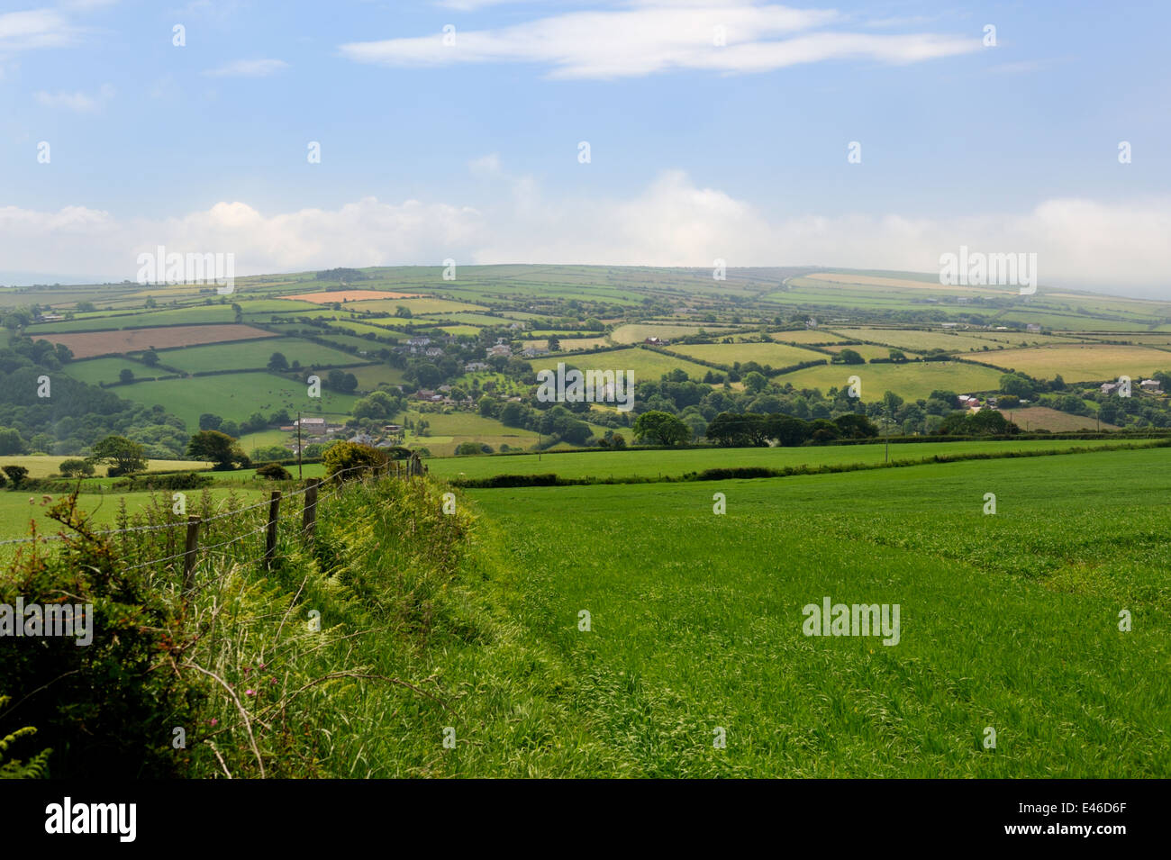 Wales countryside with grass ready for harvesting and patchwork fields ...