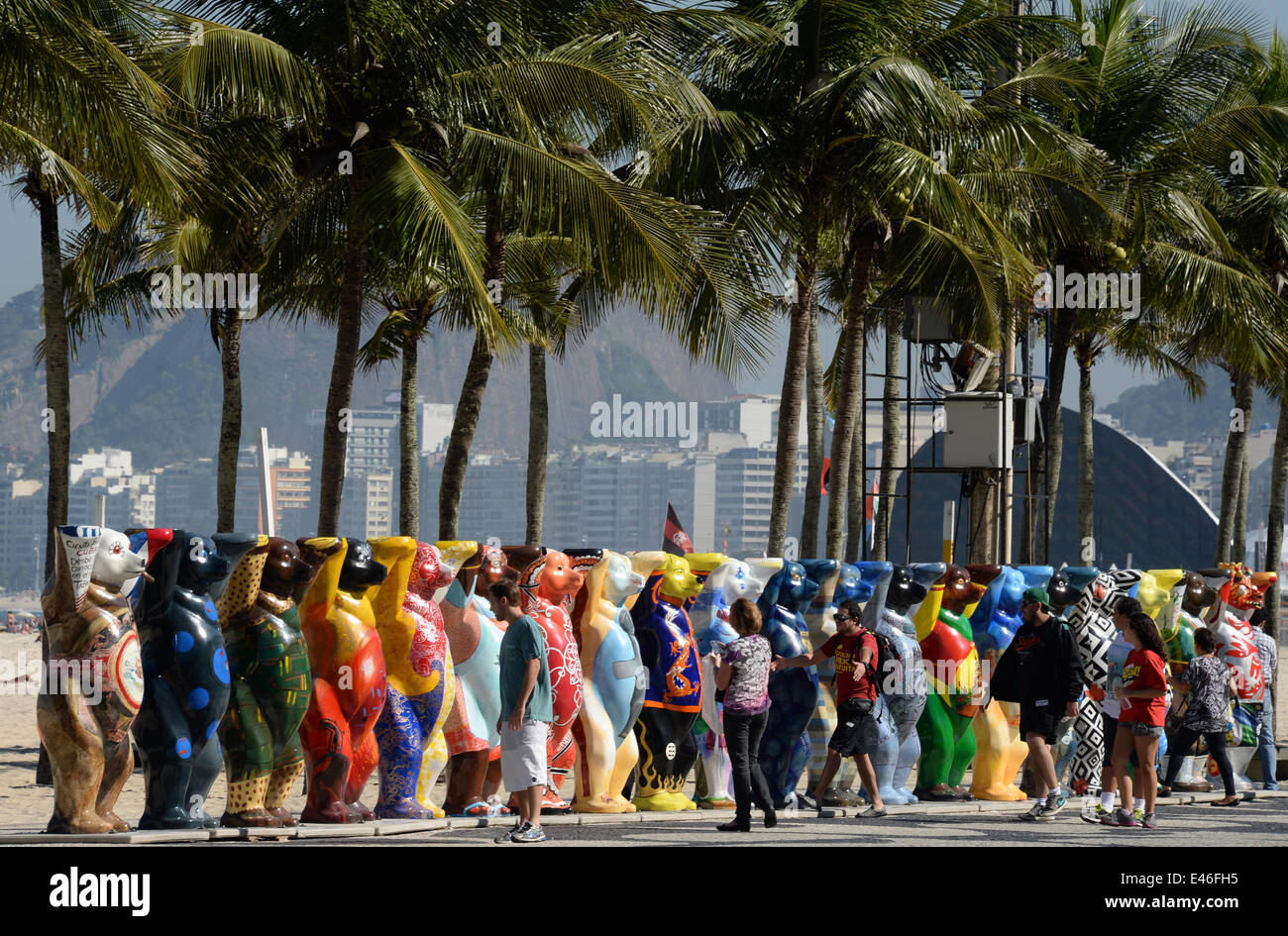 Poeple walk along some of the 145 bear sculptures that form the 'United ...