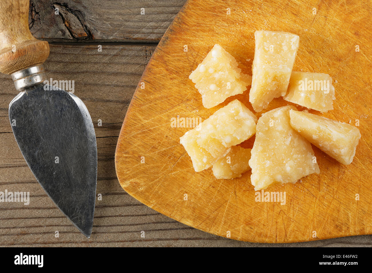 top view closeup cheese parmigiano on wood background Stock Photo - Alamy