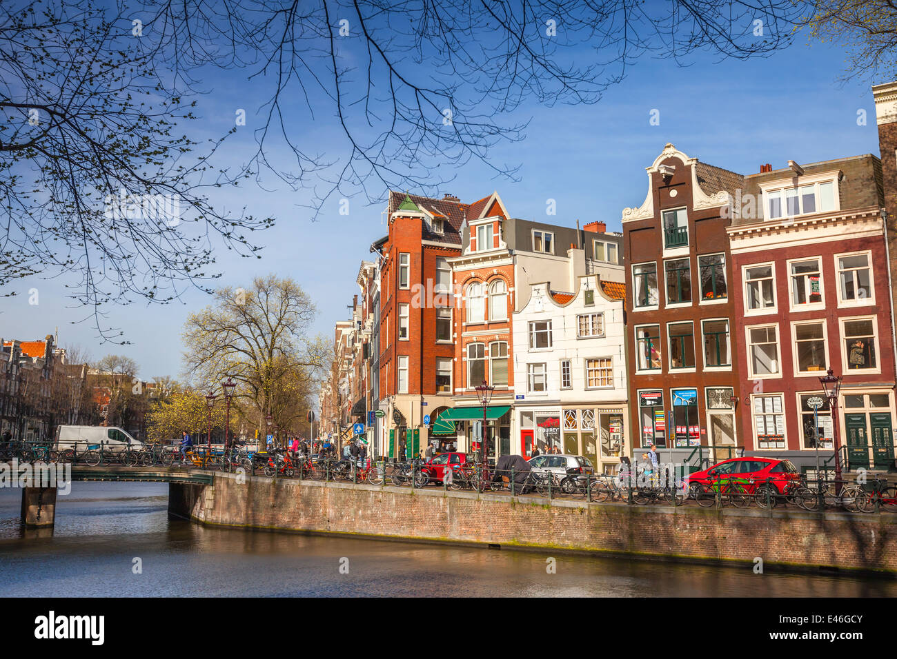Amsterdam canal, colorful houses facades Stock Photo - Alamy