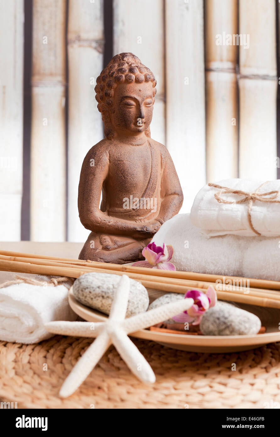 buddha statue and spa items in sauna, relaxation background Stock Photo ...