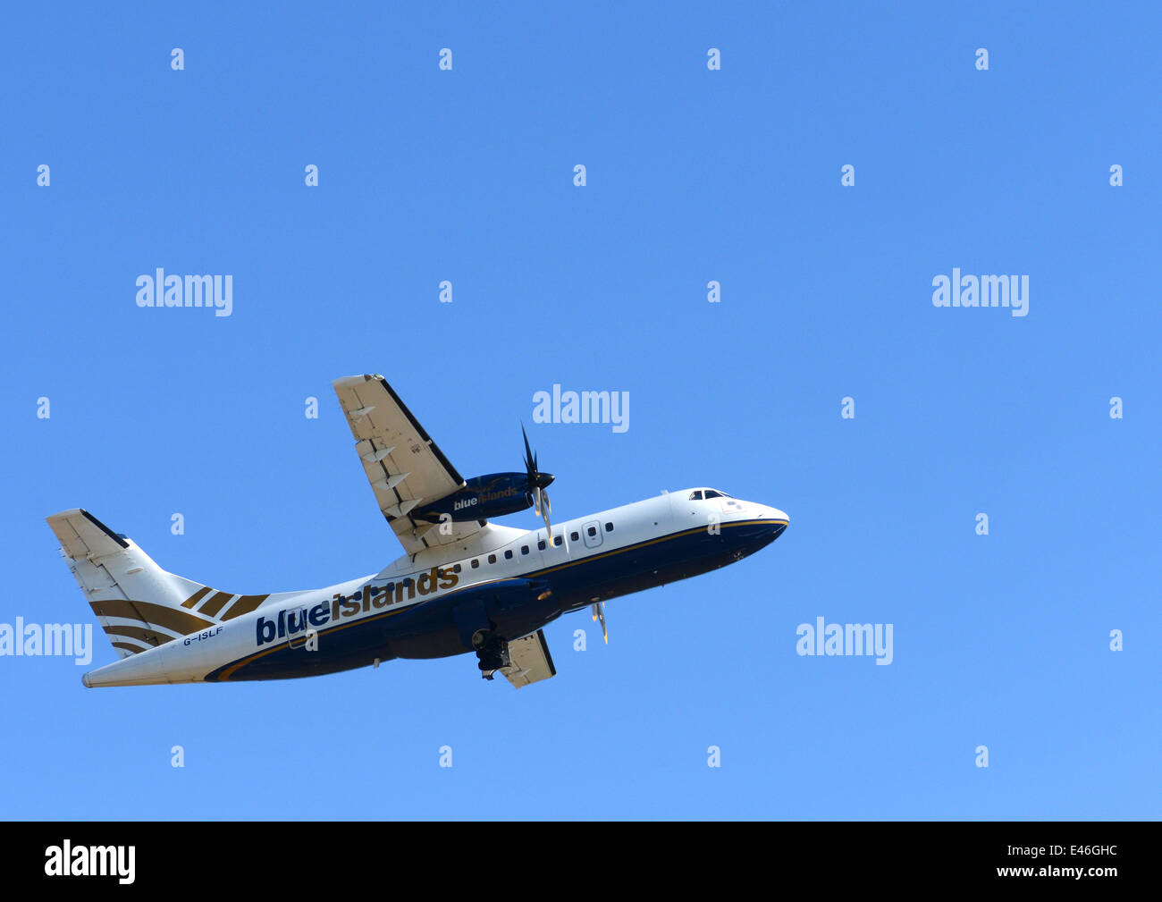 Blue Islands Aircraft flying against a blue sky Stock Photo - Alamy