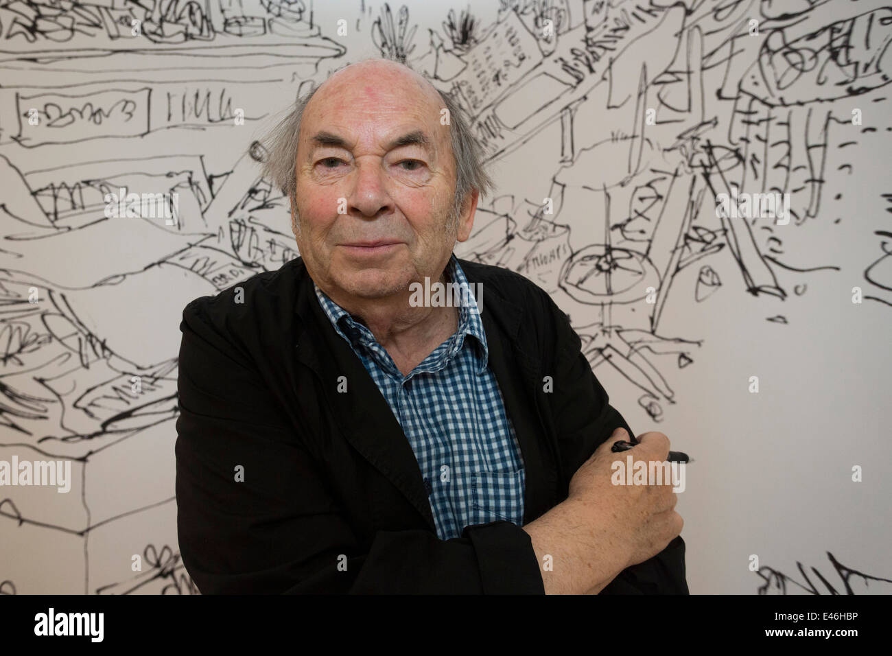 Illustrator Sir Quentin Blake poses in front of an illustration of his ...