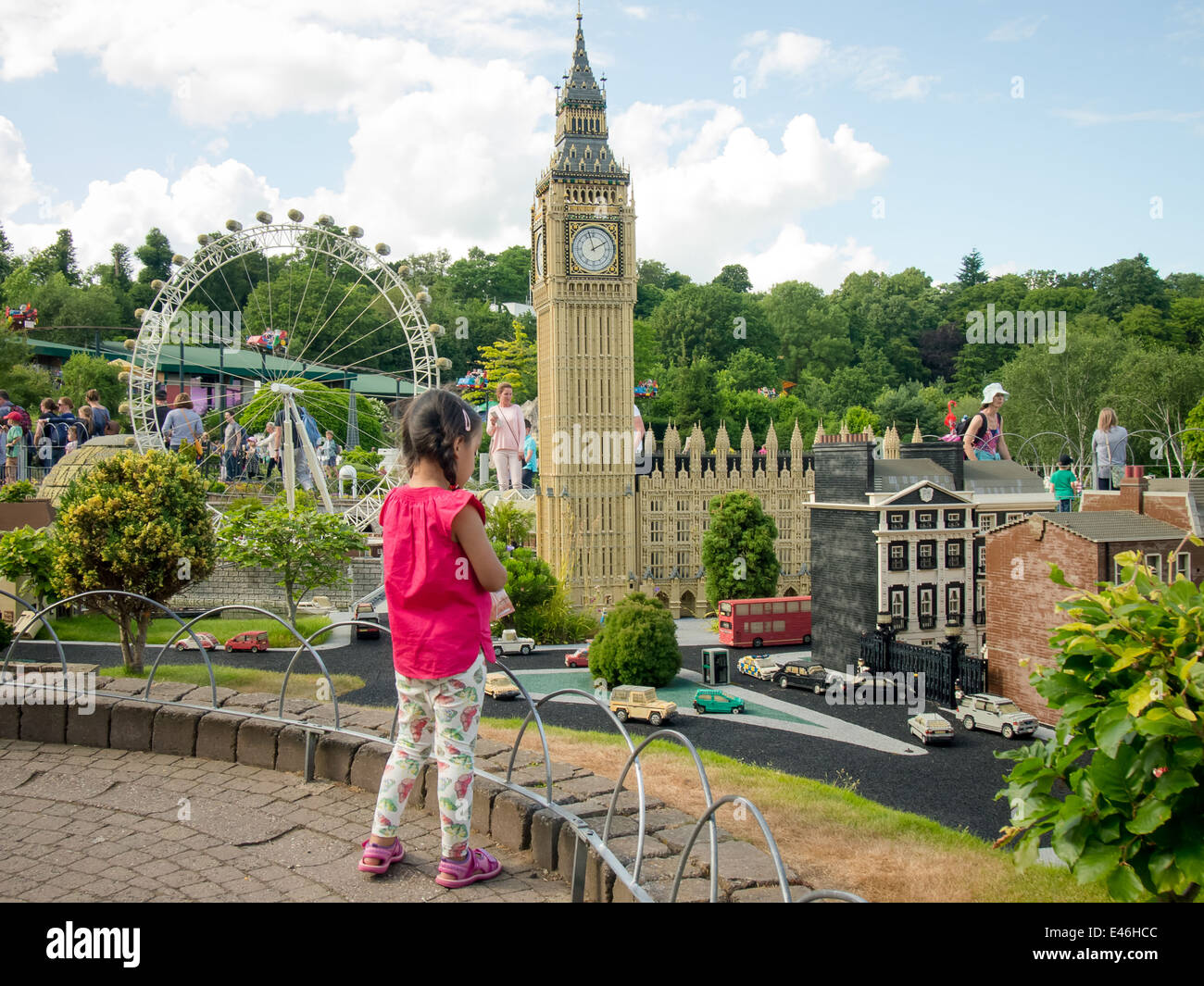 A young girl looks at a model of the city of London made from thousands ...