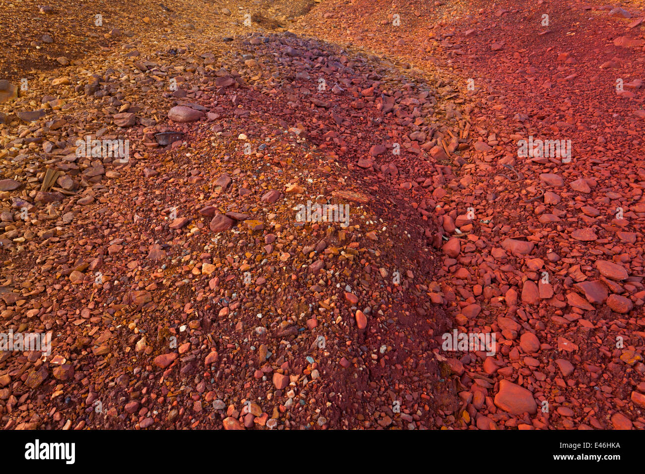 Rock and soil turn strong rusty, red, purple and brown colours as ...