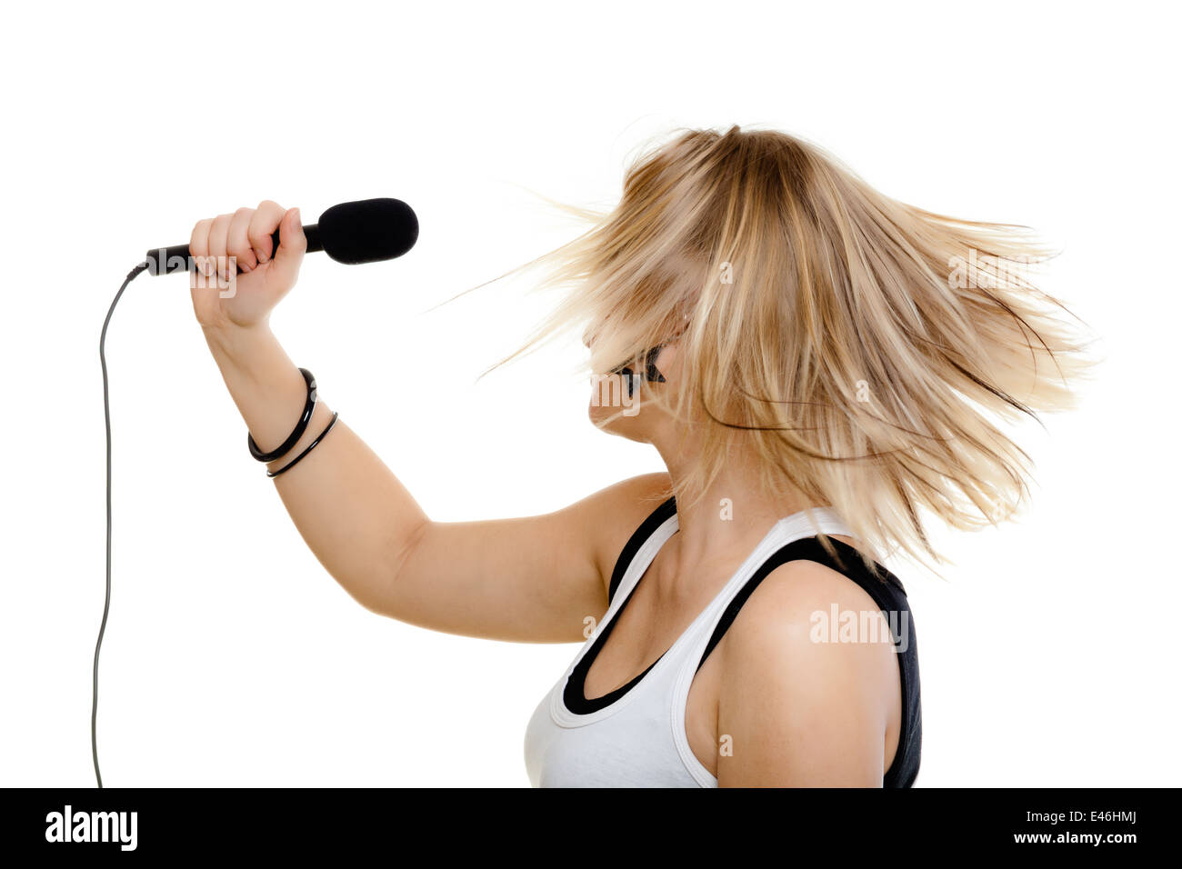 Female singing blonde hair hi-res stock photography and images - Alamy