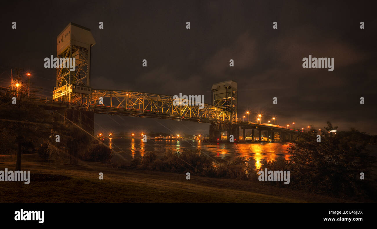 A dramatic night time,panoramic view of The Cape Fear River Memorial ...