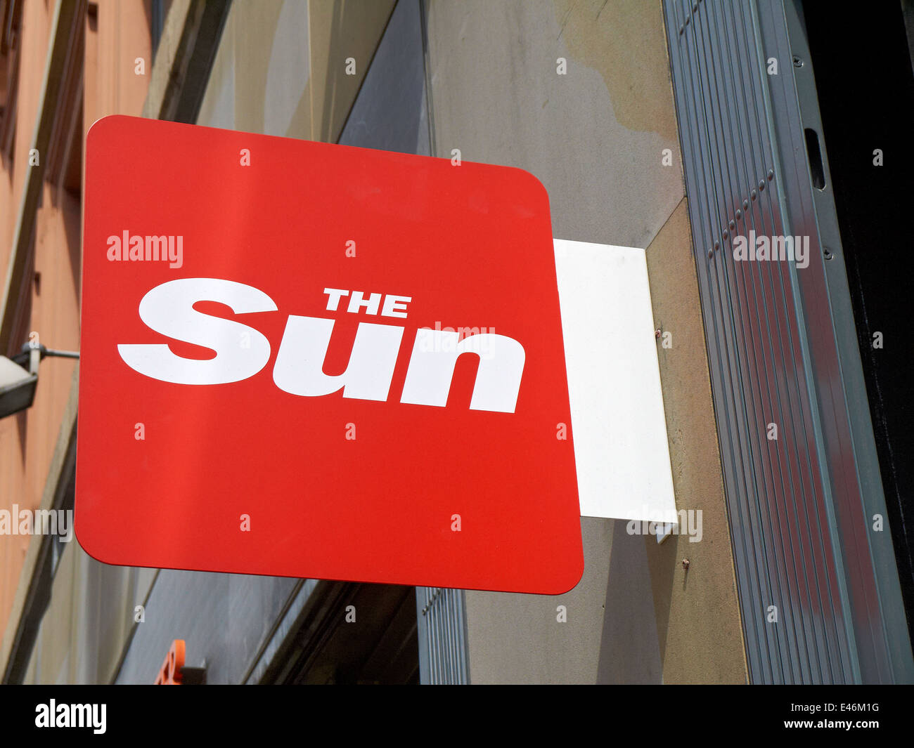 The Sun newspaper sign on outside wall UK Stock Photo - Alamy
