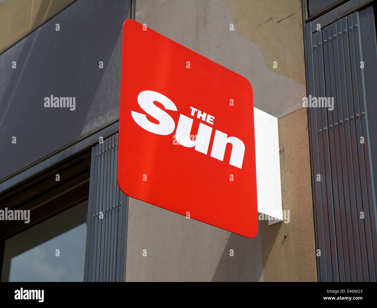 The Sun newspaper sign on outside wall UK Stock Photo - Alamy