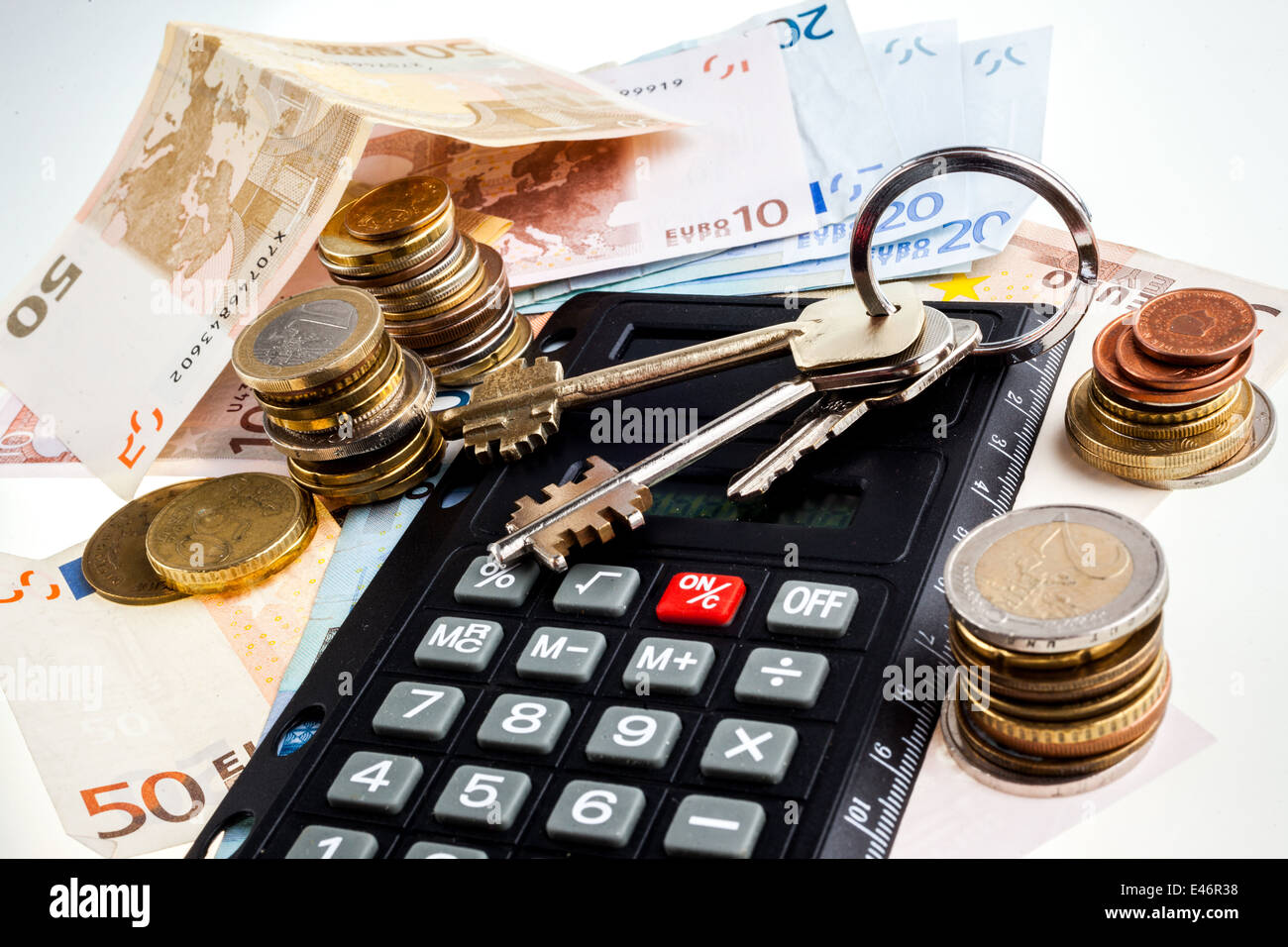 Money and keys. Close-up objects on the white background Stock Photo ...