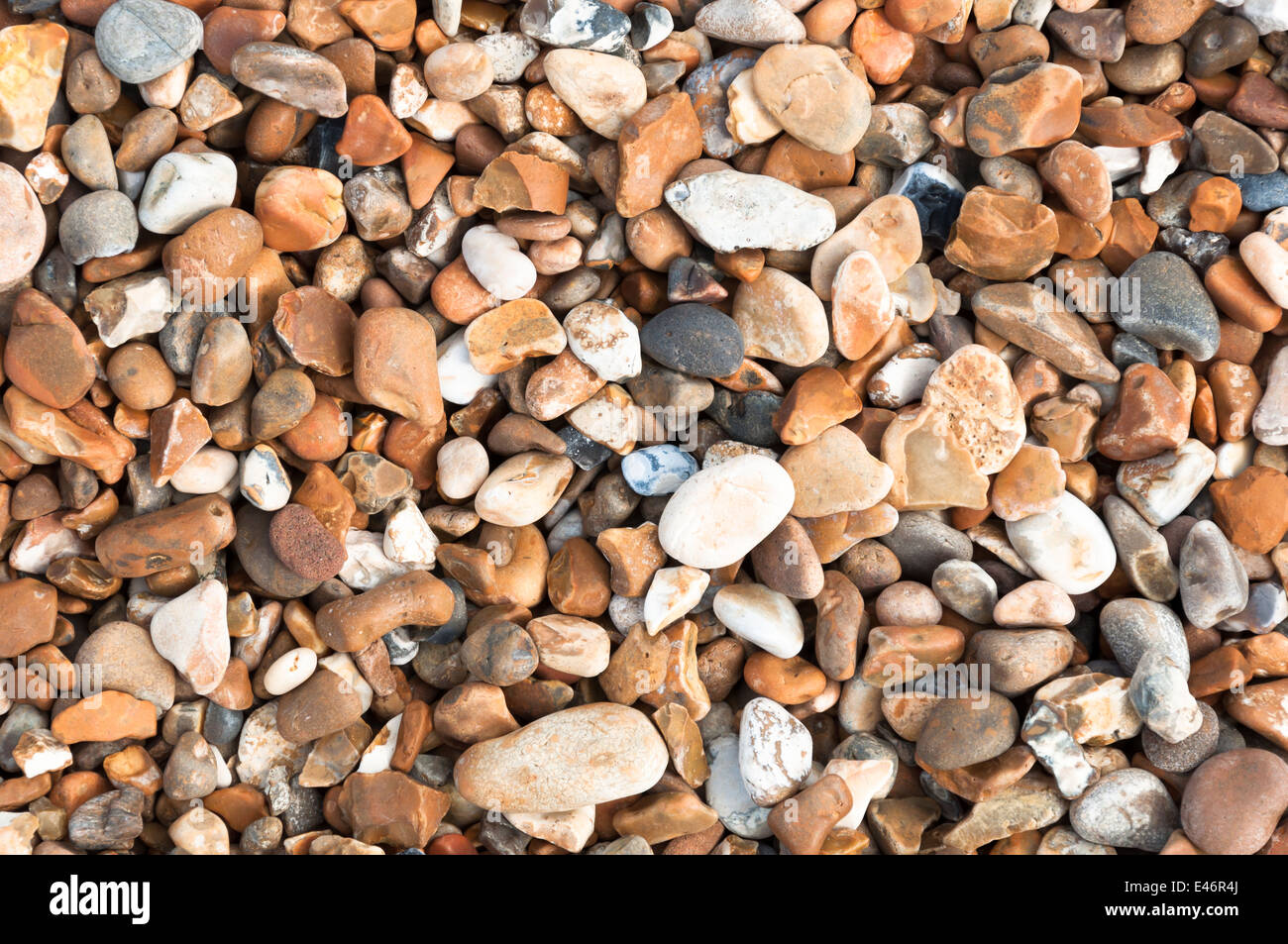 Colourful pebbles as a background Stock Photo - Alamy