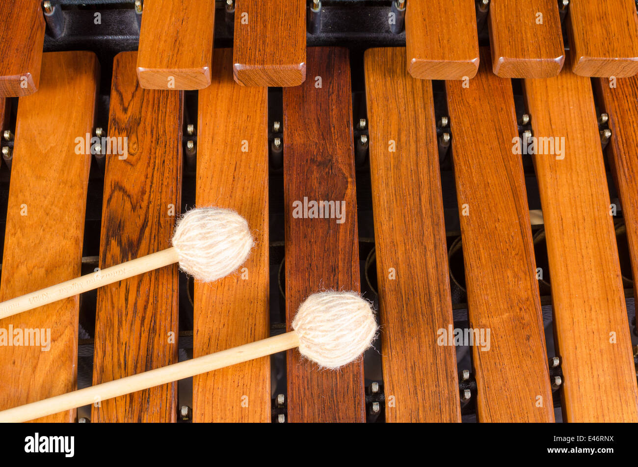 Full frame take of two mallets resting on the keys of a marimba Stock ...