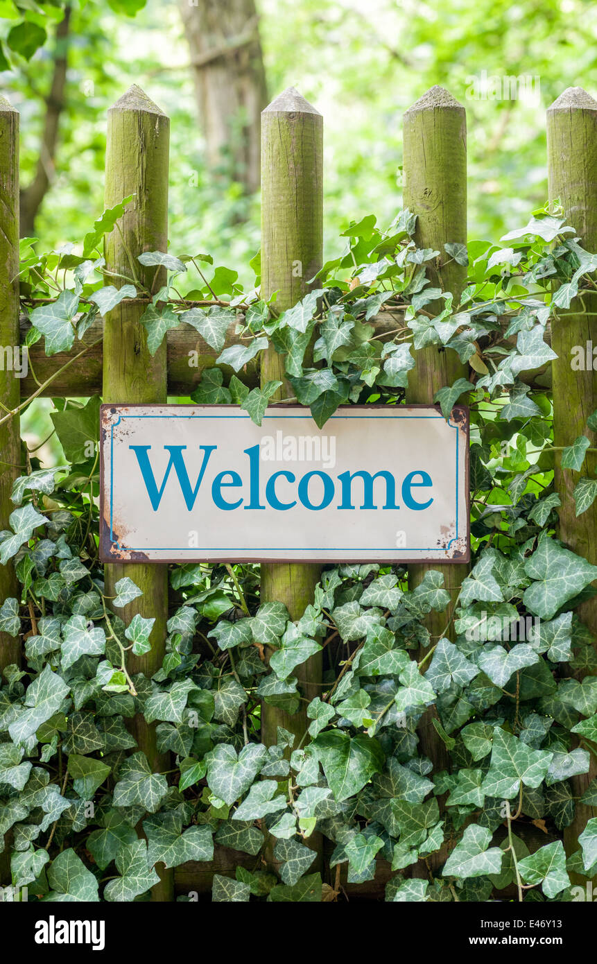 Old metal sign with the inscription Welcome Stock Photo - Alamy