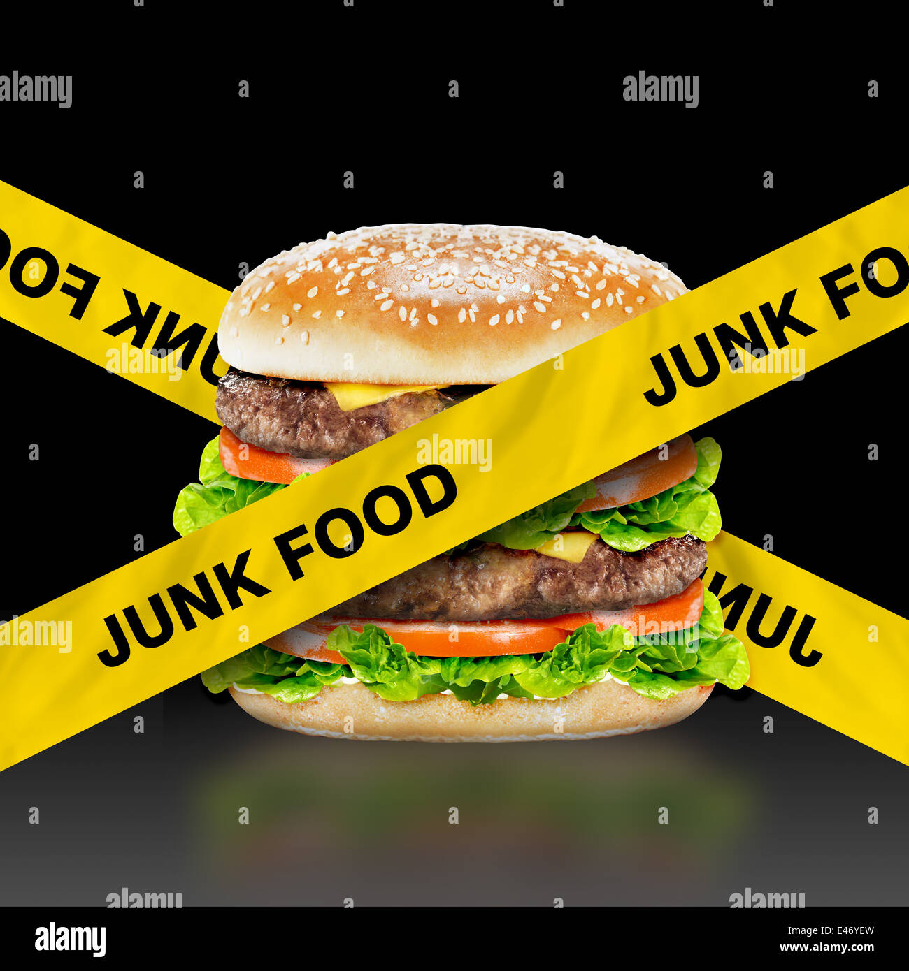 Junk Food, burger with warning message on black background Stock Photo ...