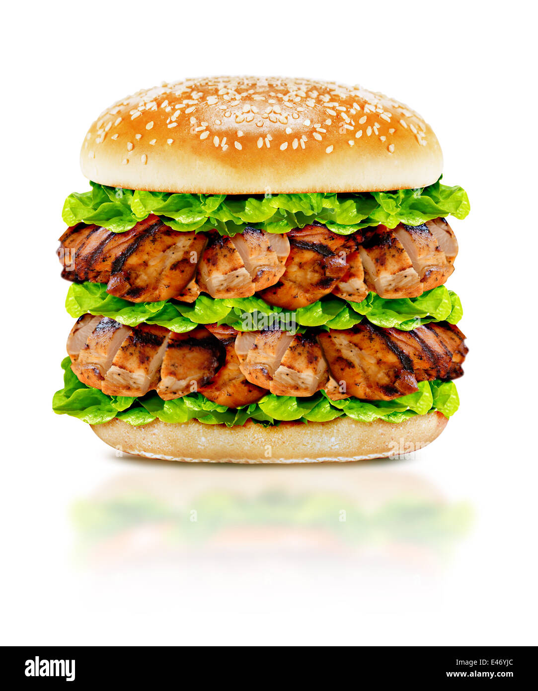 Delicious chicken burger with beef, tomato, cheese and lettuce on white ...